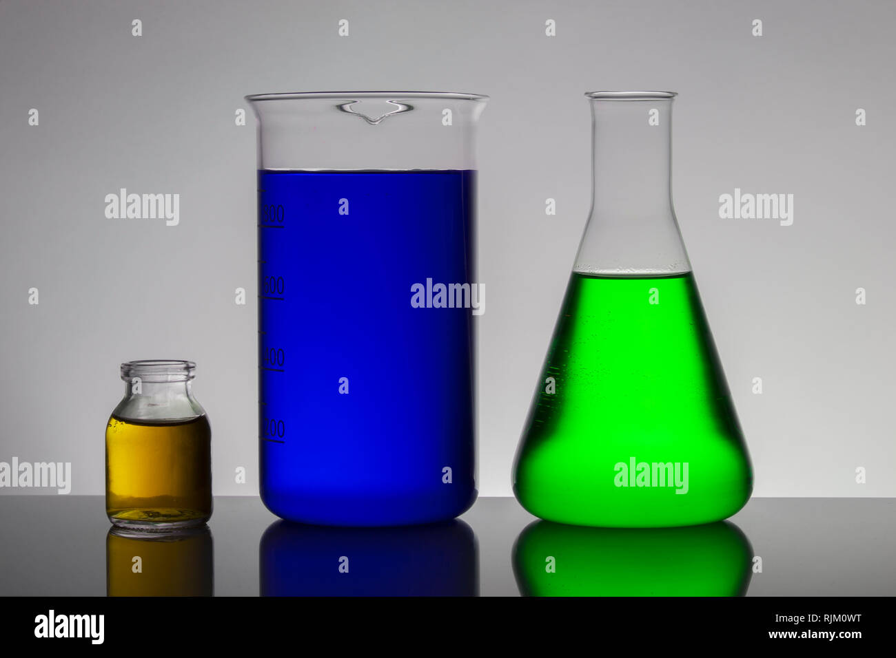 Liquid in laboratory bottles. Scientific biochemical laboratory ...