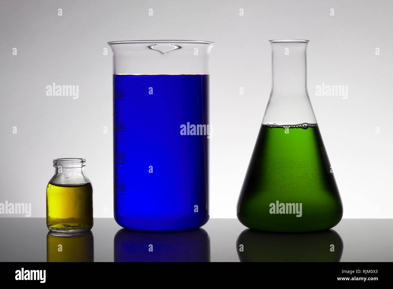 Liquid in laboratory bottles. Scientific biochemical laboratory ...