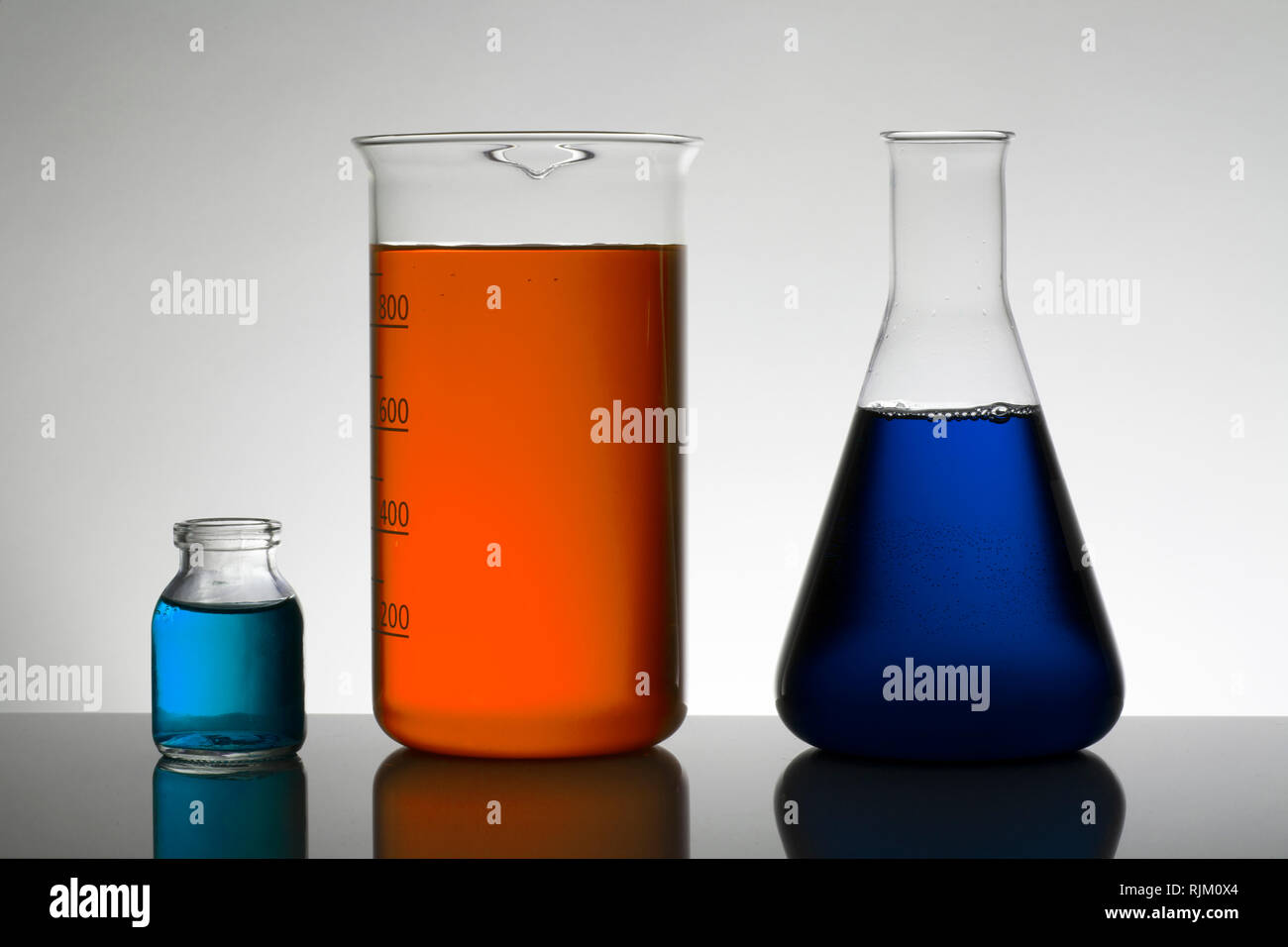 Liquid in laboratory bottles. Scientific biochemical laboratory ...