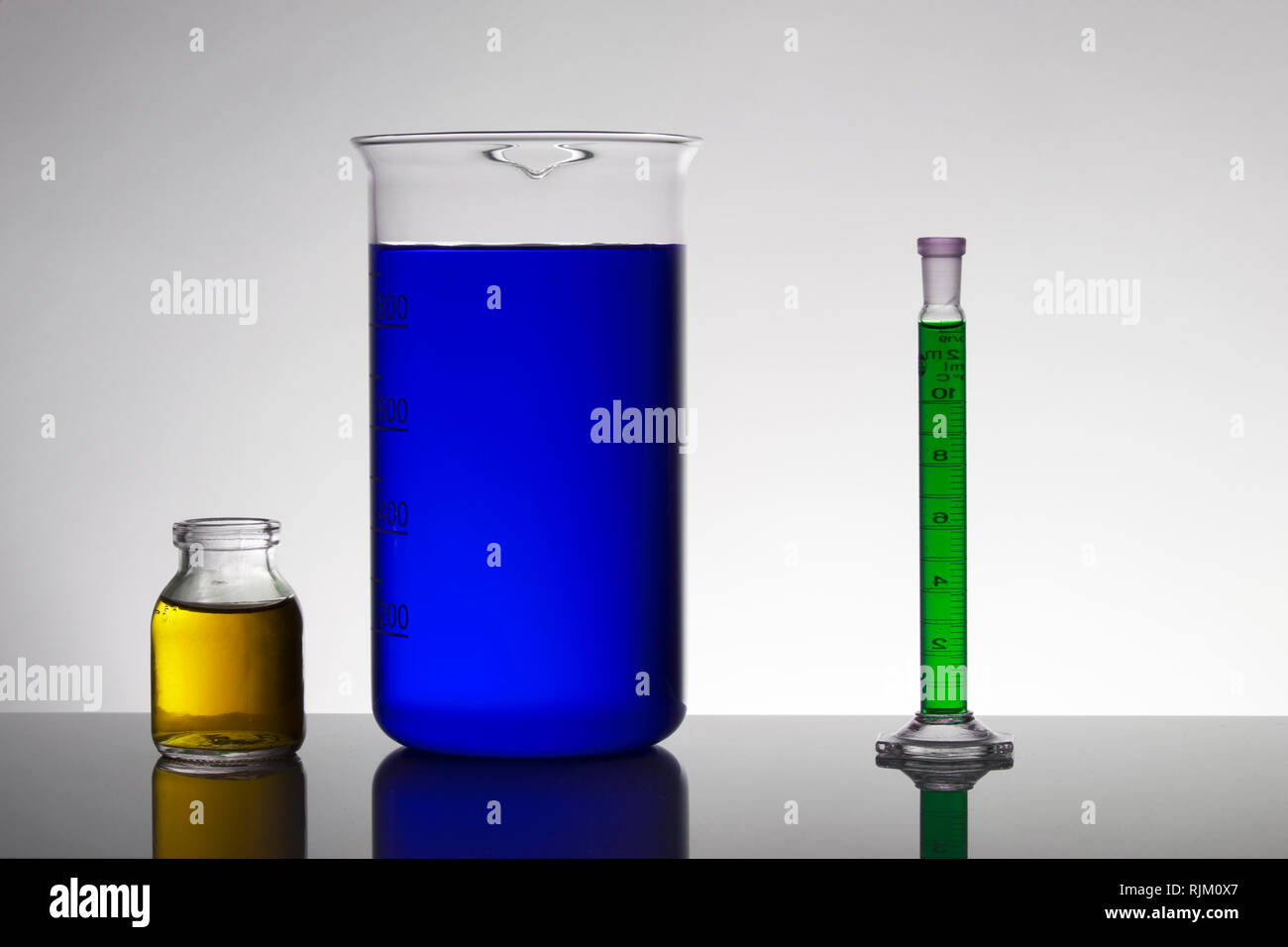 Liquid in laboratory bottles. Scientific biochemical laboratory ...
