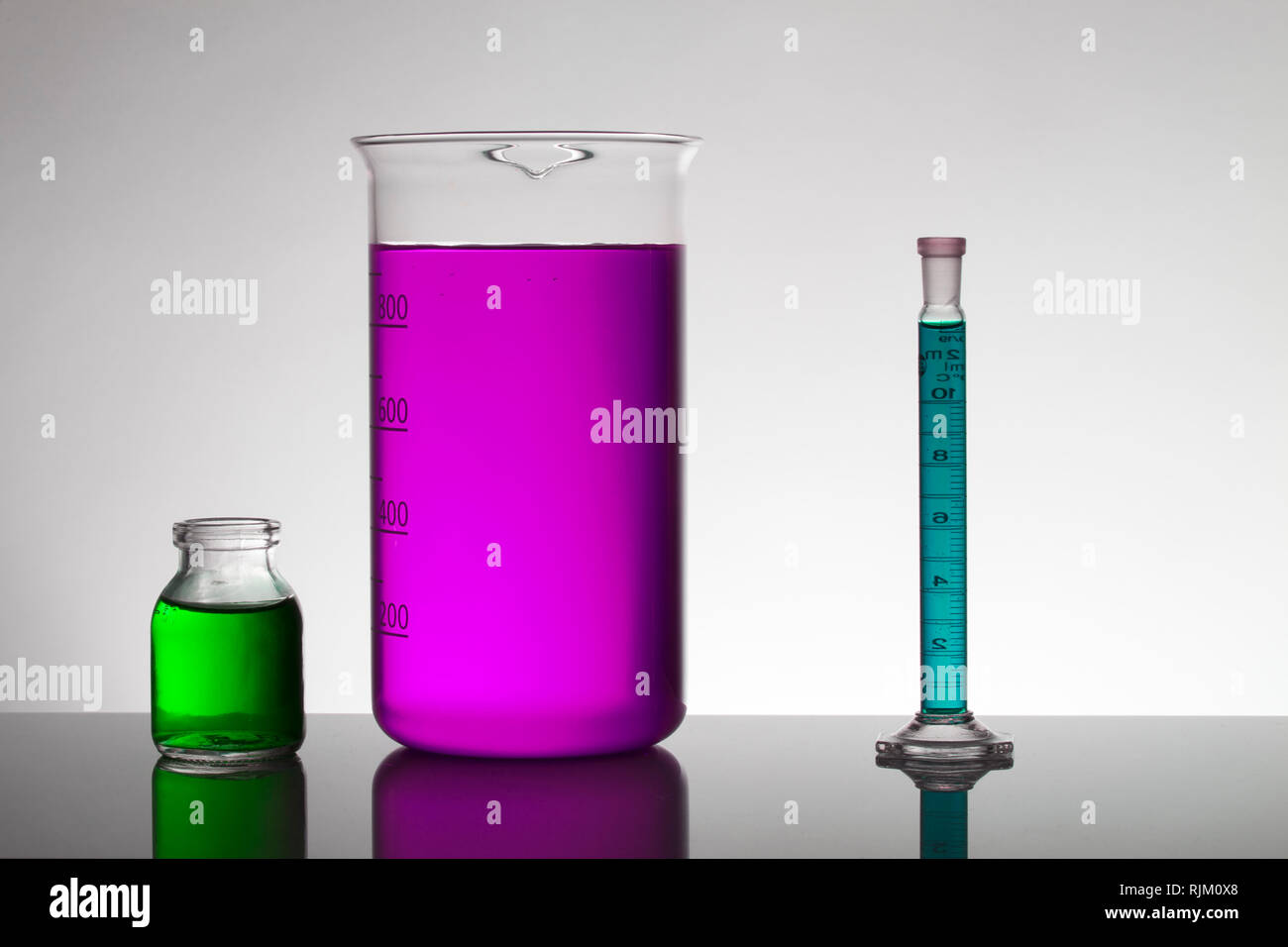 Liquid in laboratory bottles. Scientific biochemical laboratory ...