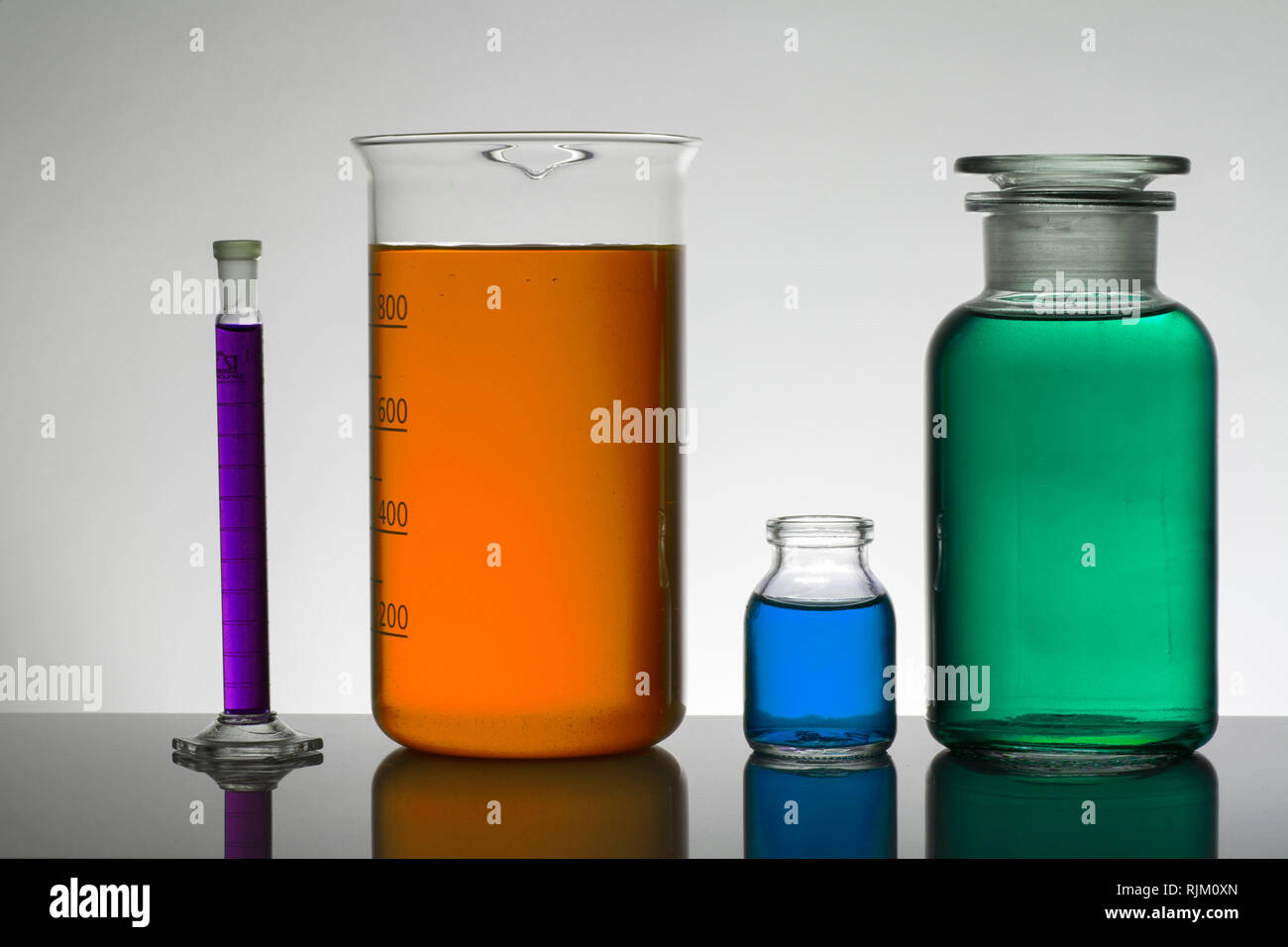 Liquid in laboratory bottles. Scientific biochemical laboratory ...