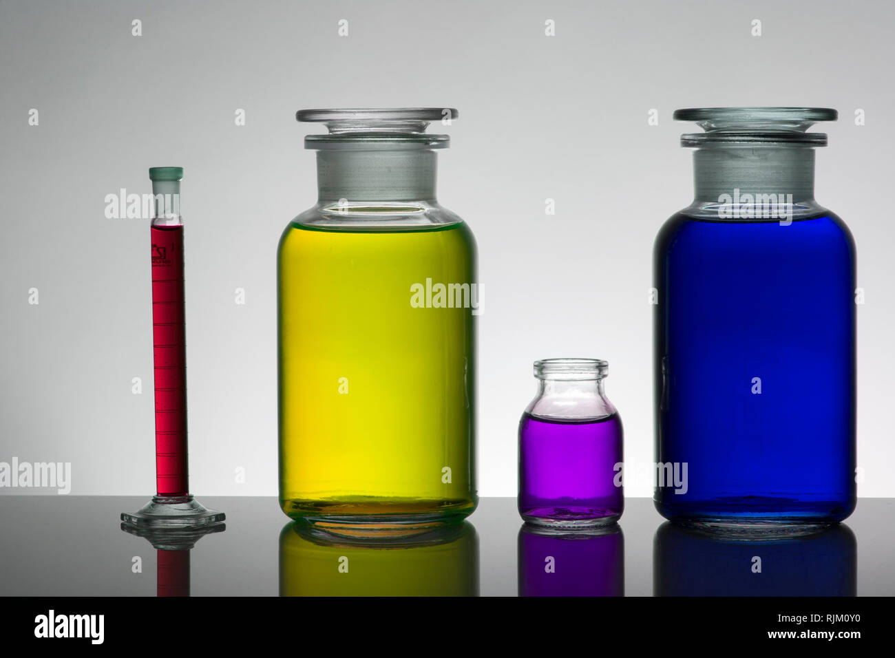 Liquid in laboratory bottles. Scientific biochemical laboratory ...