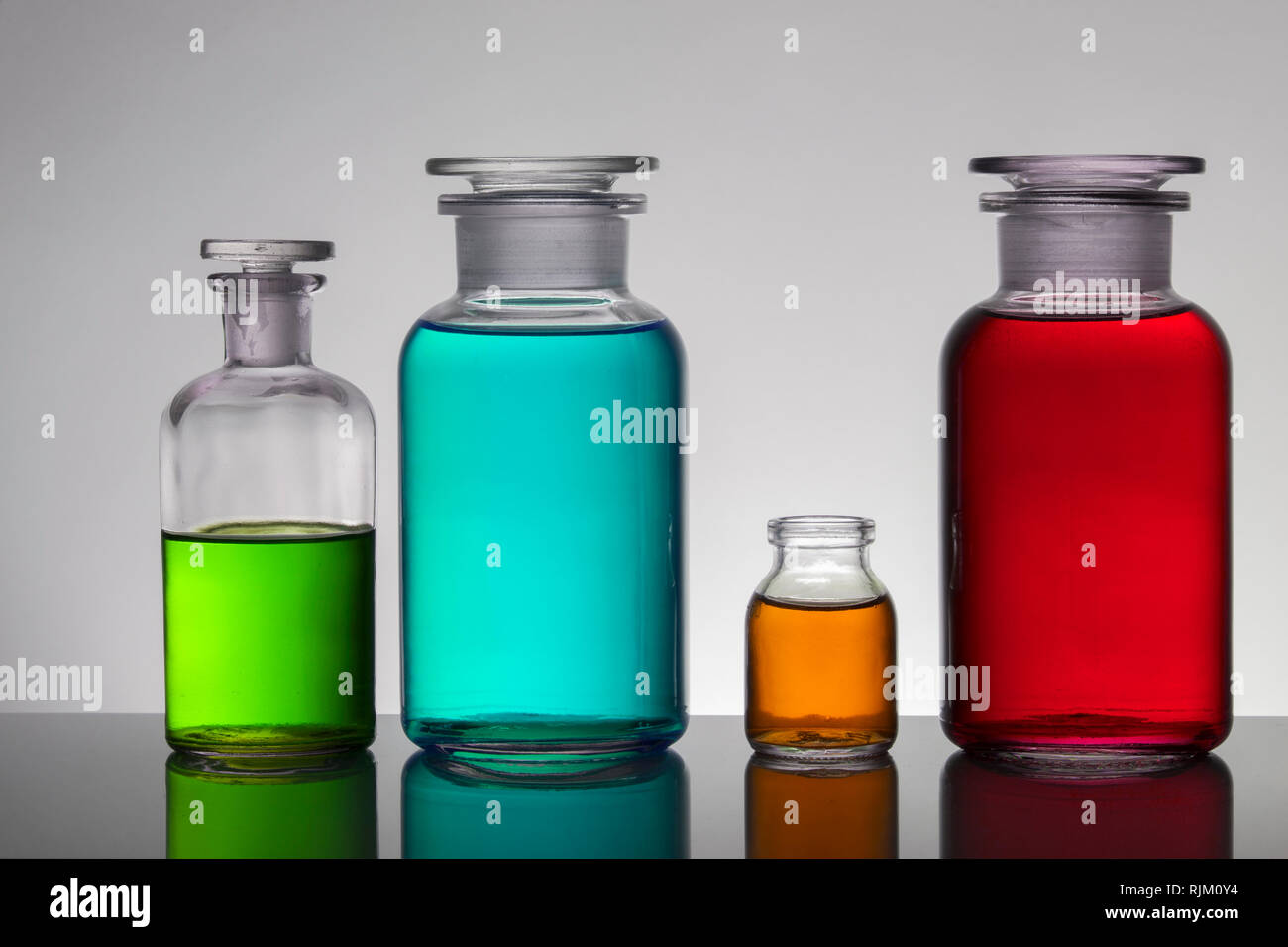 Liquid in laboratory bottles. Scientific biochemical laboratory ...