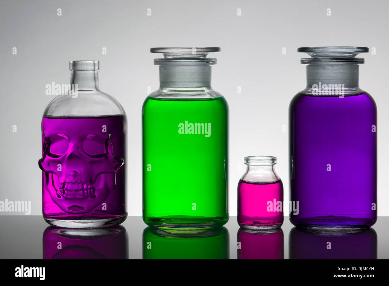 Liquid in laboratory bottles. Scientific biochemical laboratory ...