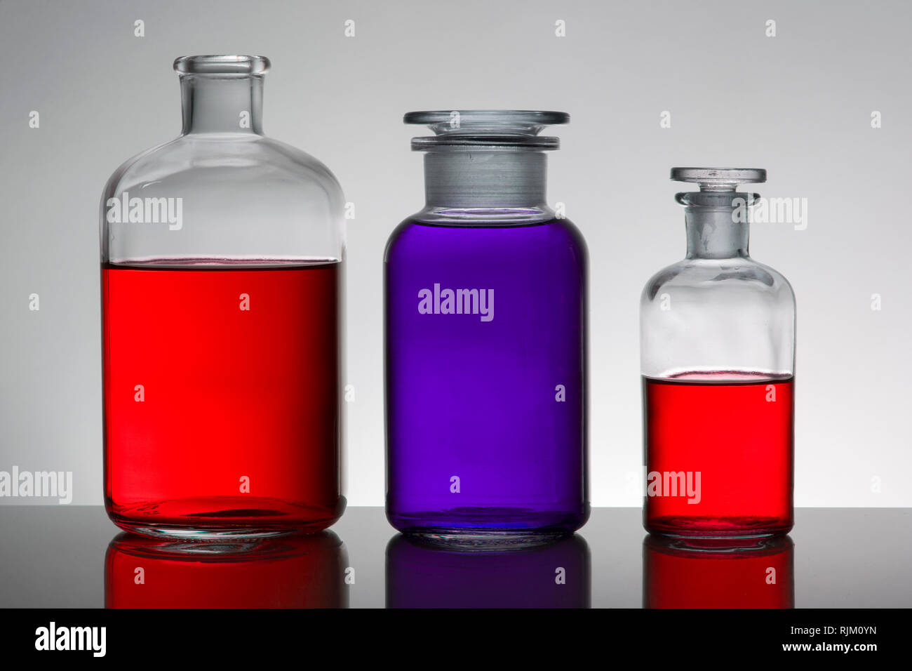 Liquid in laboratory bottles. Scientific biochemical laboratory ...