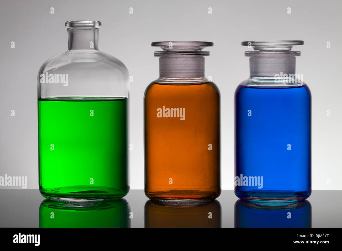 Liquid in laboratory bottles. Scientific biochemical laboratory ...