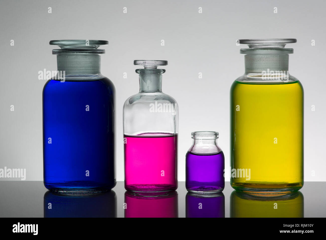 Liquid in laboratory bottles. Scientific biochemical laboratory ...