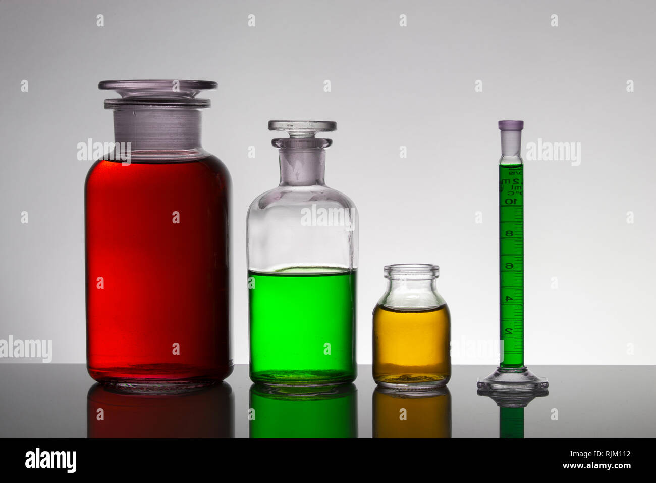 Liquid in laboratory bottles. Scientific biochemical laboratory ...
