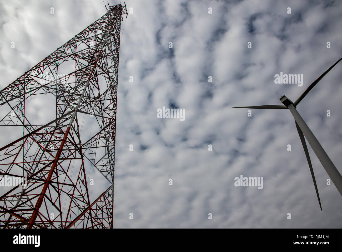 Close up Wind turbine with high power tower. Eco power Stock Photo - Alamy