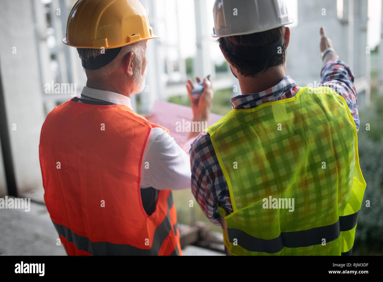 Team of business people in group, architect and engeneer on building ...
