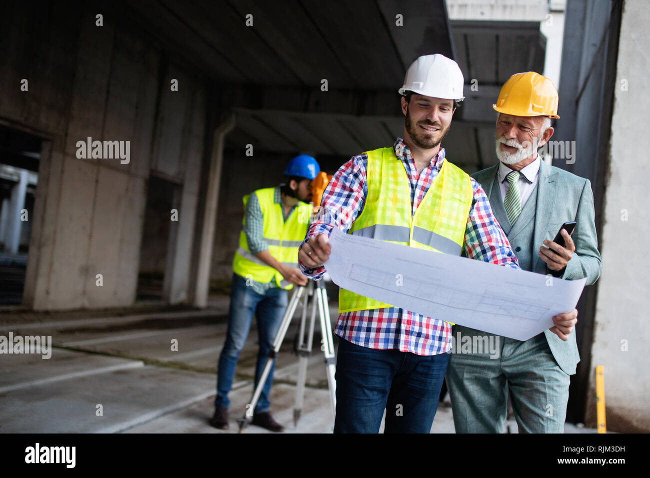 Group of construction engineer working in construction site Stock Photo ...