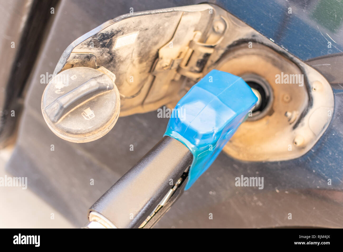 Blue color fuel pump gun hi-res stock photography and images - Alamy