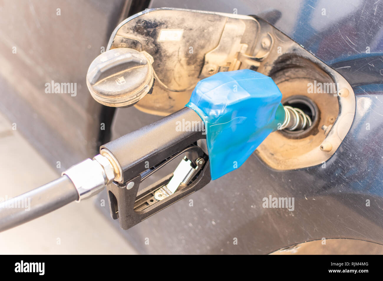 Man fuel nozzle hi-res stock photography and images - Alamy