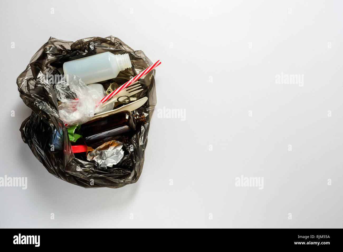 Unsorted Garbage in plastic bag. Recycle concept Stock Photo - Alamy