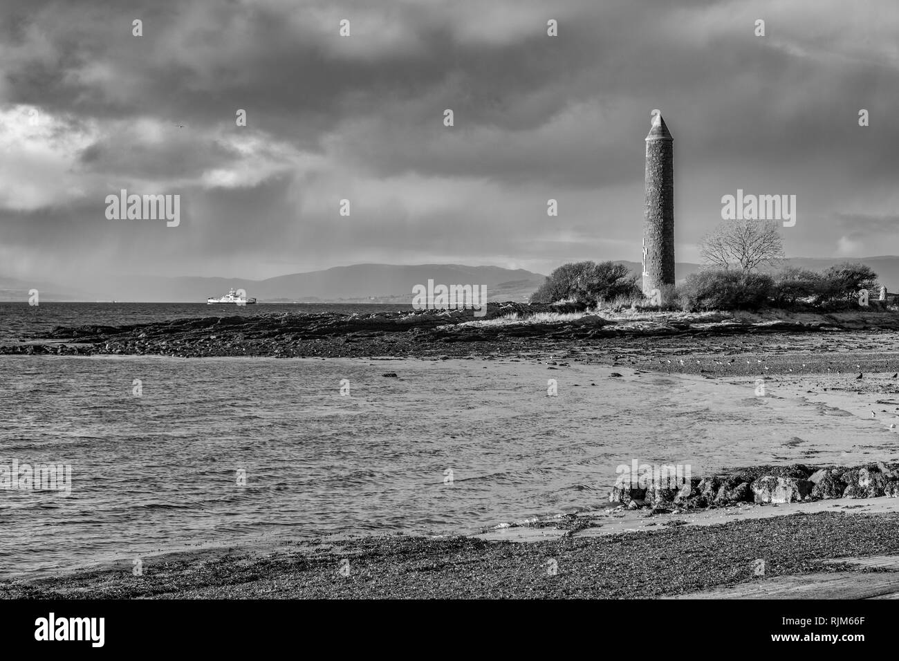 Largs foreshore looking past the Pencil Monument there to commemorate ...