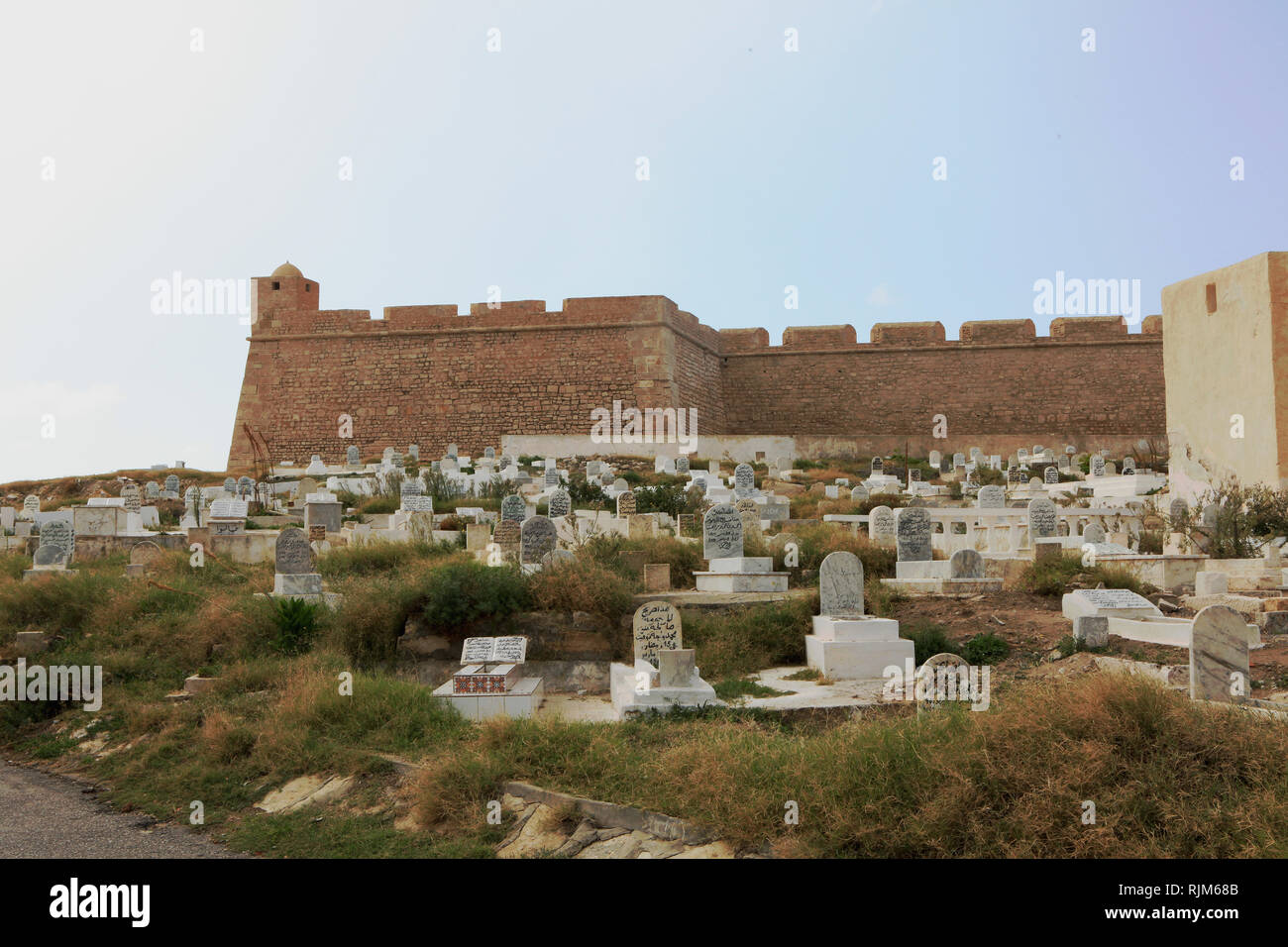 Cemetery next to the Fortress of Borj El-Kebir Ottoman ruin Stock Photo ...