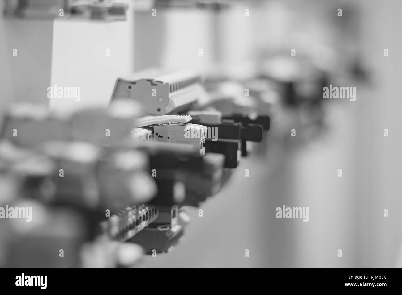 Electrical panel at a assembly line factory. Controls and switches ...