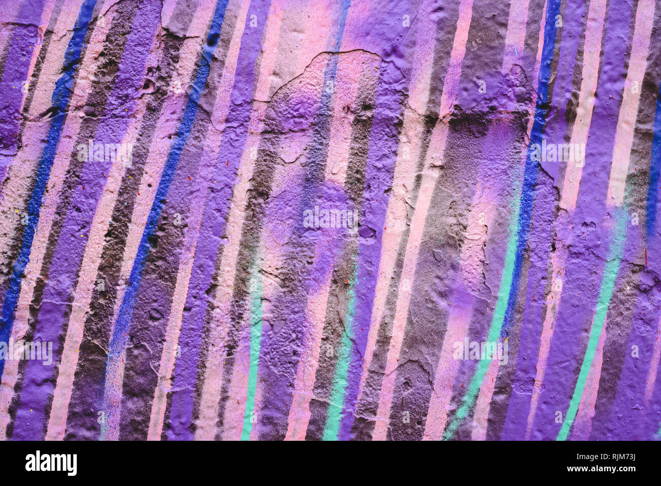 Detail of an anonymous street graffiti with many colors, cheerful urban ...