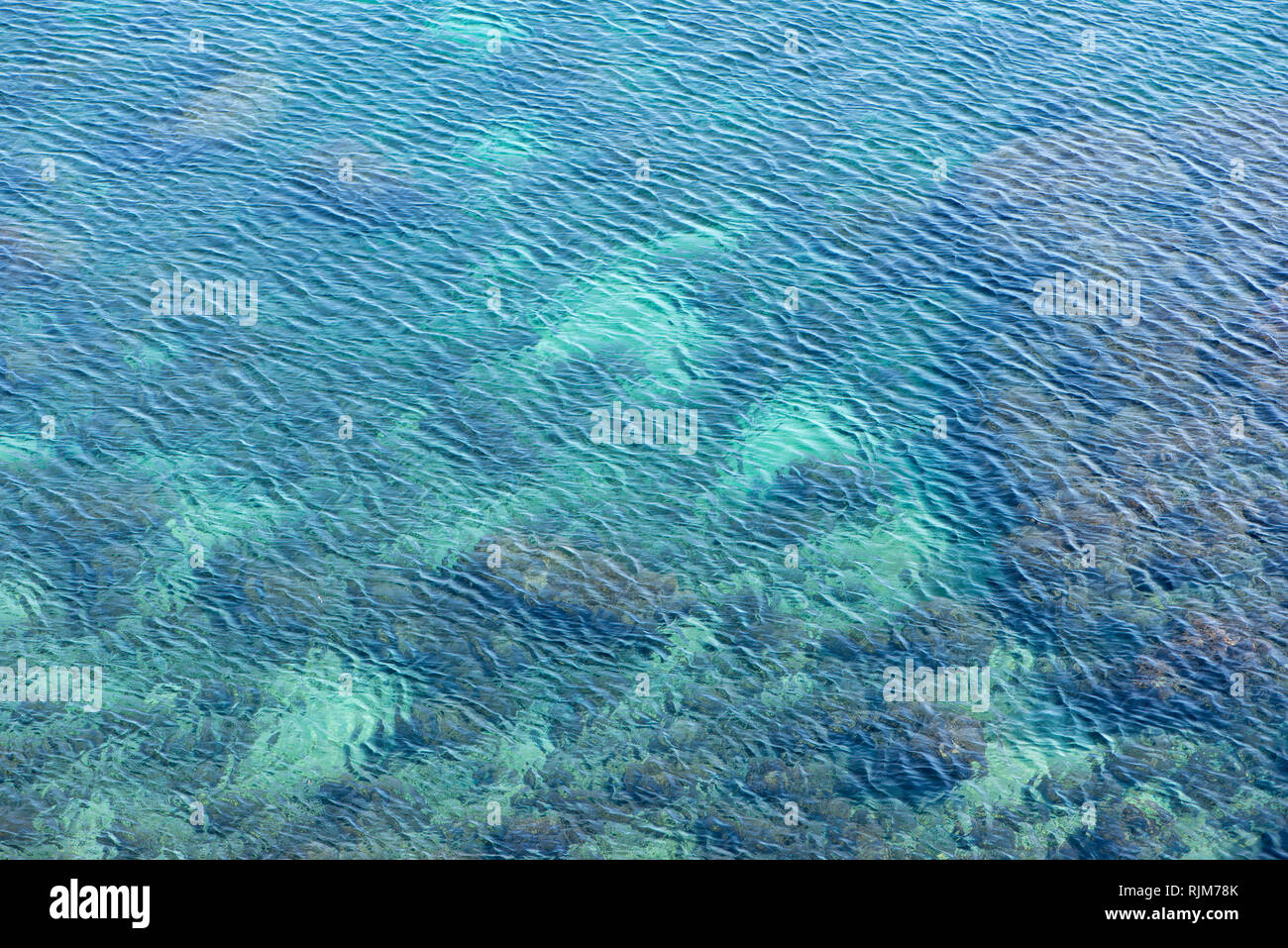 Sea background in a transparent and blue water, Spain Stock Photo - Alamy