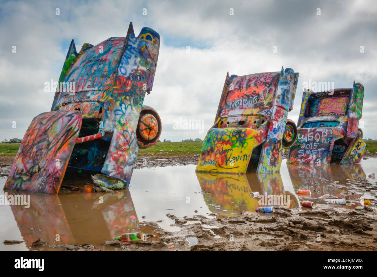 Cadillac Ranch is an art installation comprised of old Cadillacs half ...