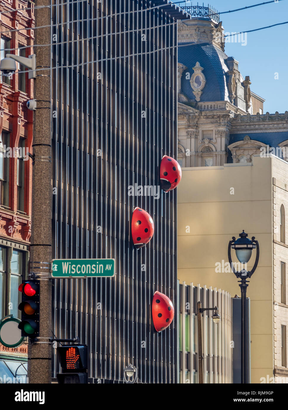 Modern art Ladtbirds (Ladybugs) on the side of a building in downtown ...