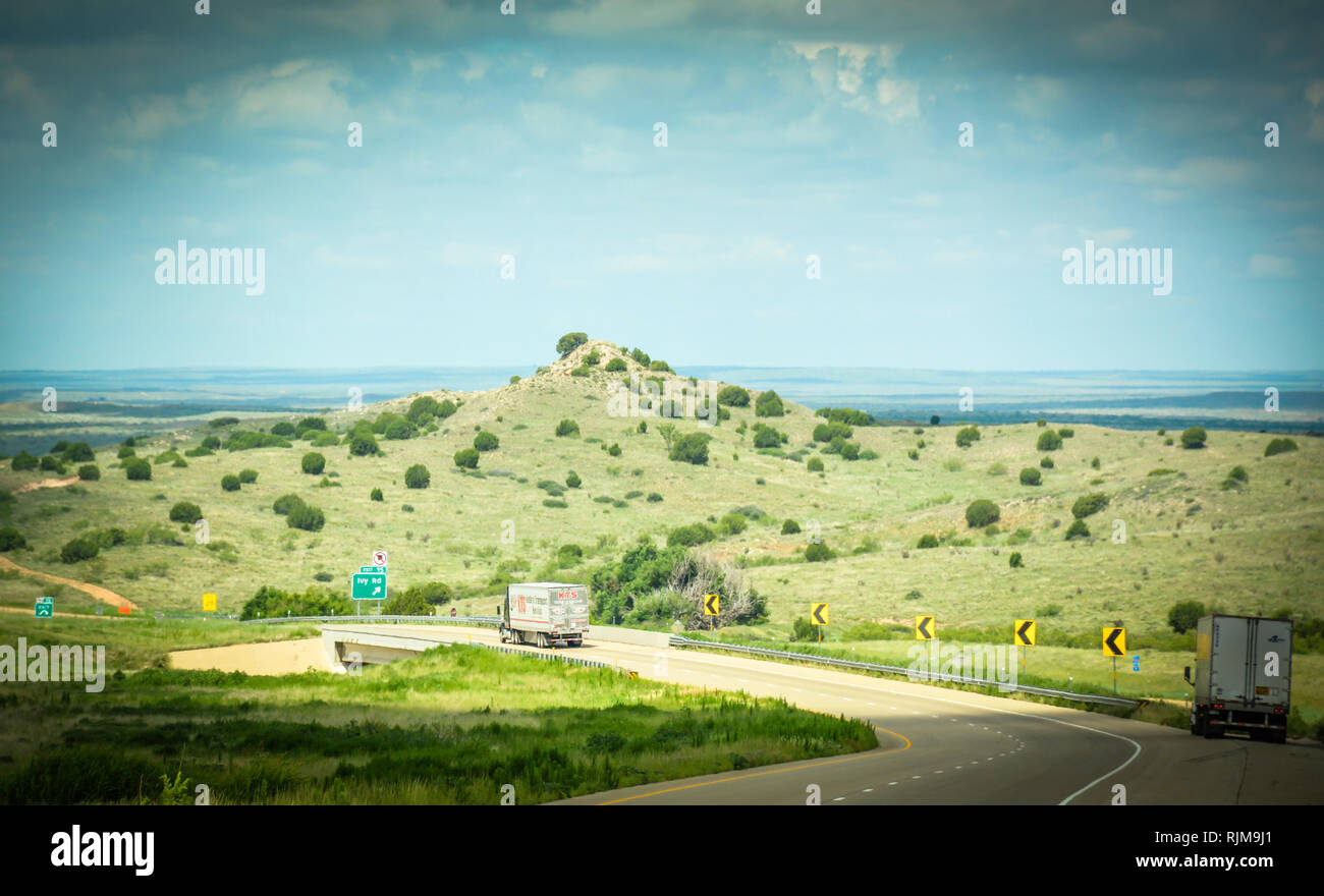 Small rolling hills along a curvy exit on the I-40/Route 66 highway in ...