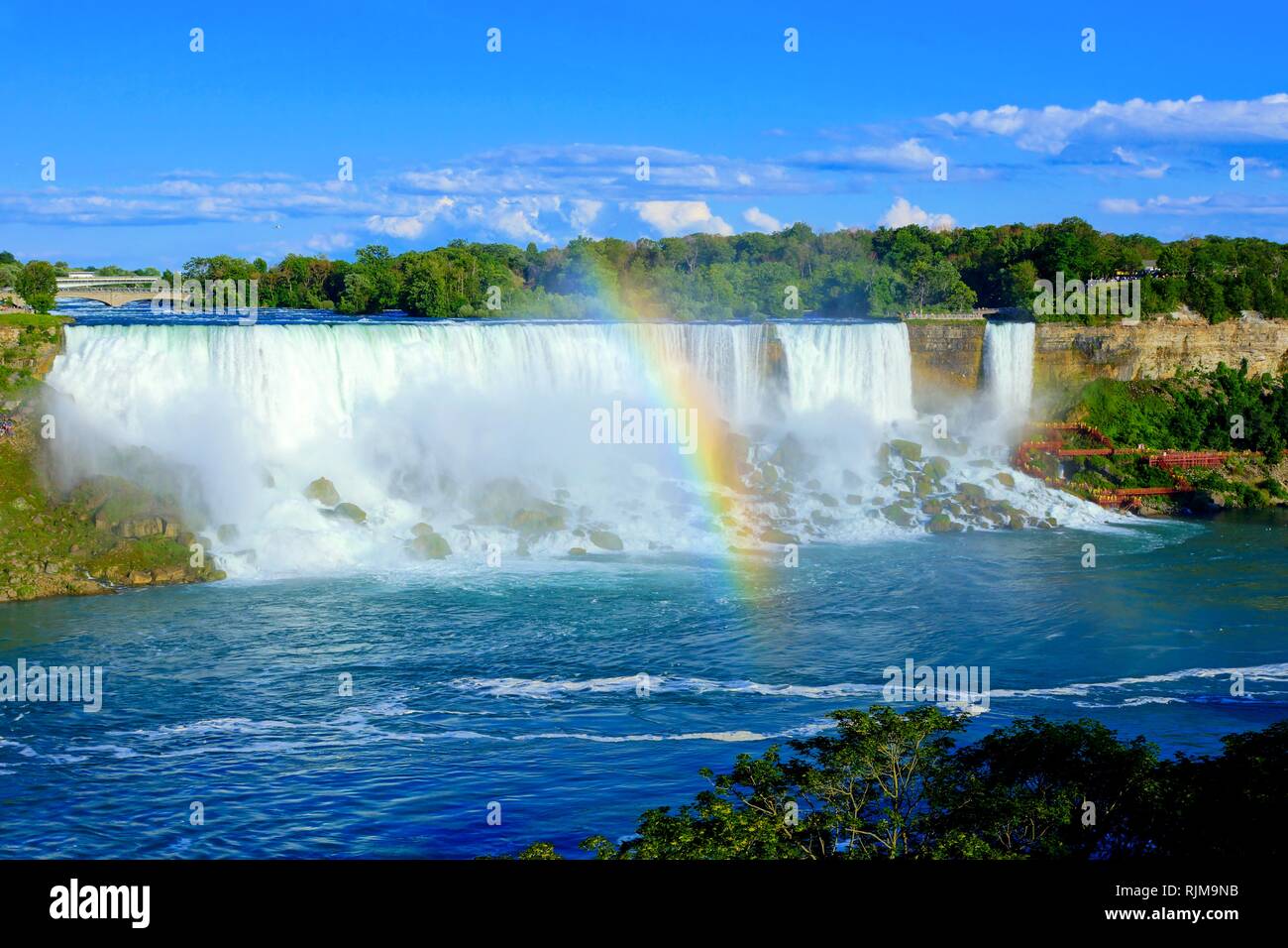 View of the American side of Niagara Falls with beautiful rainbow Stock ...