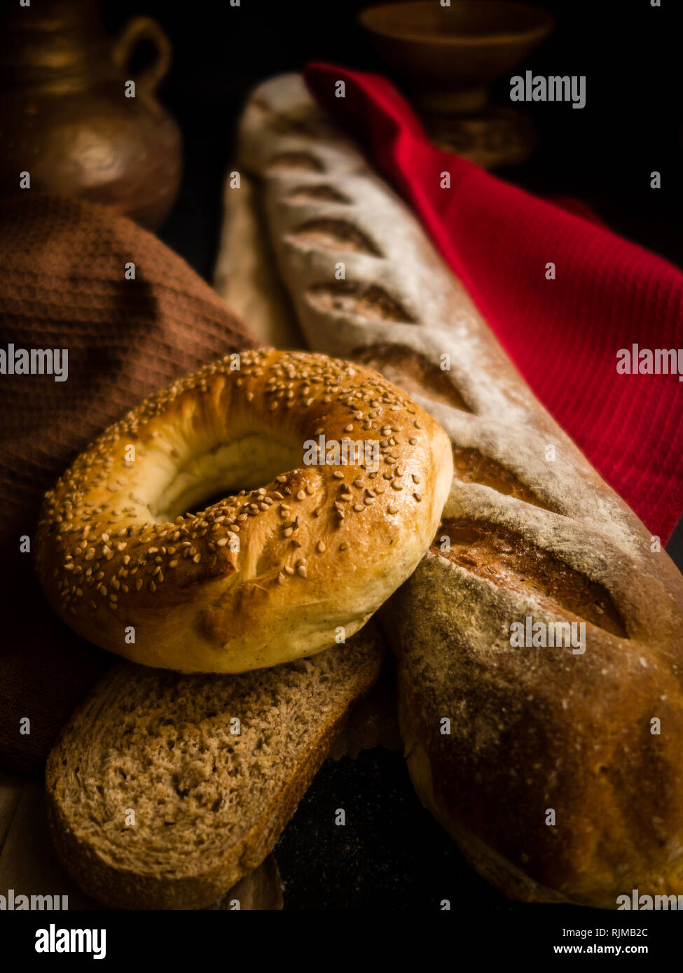 Freshly Baked Brick Oven Bread - Dark Photography Stock Photo - Alamy