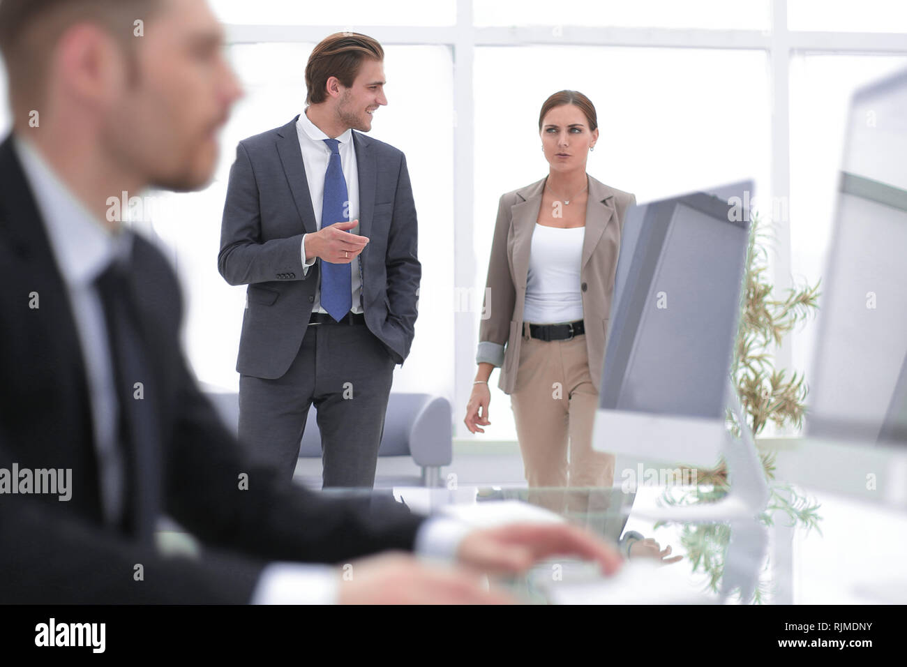 employees in a modern banking office Stock Photo - Alamy