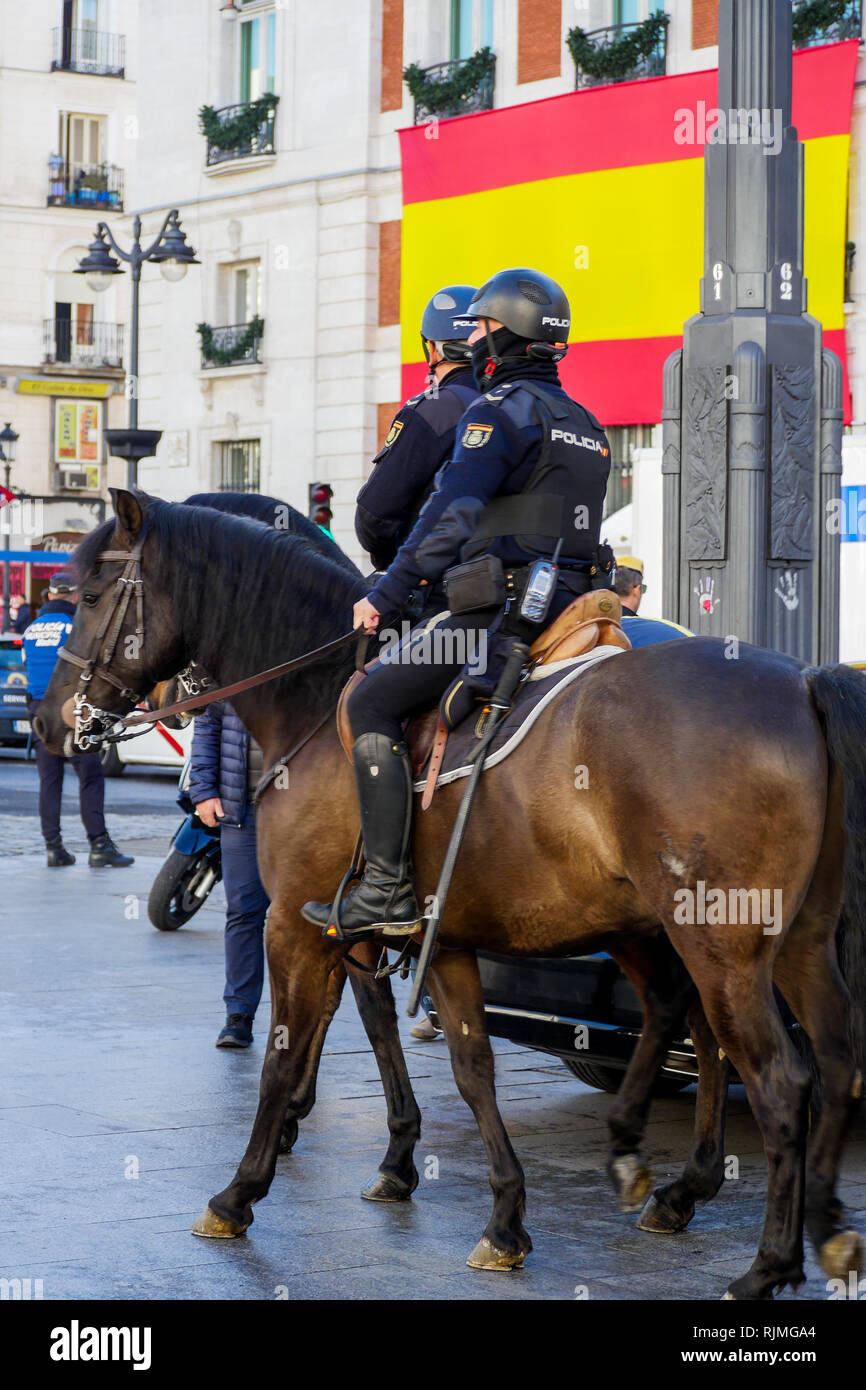 Mounted Police officers, Puerta del Sol, Madrid, Spain Stock Photo - Alamy