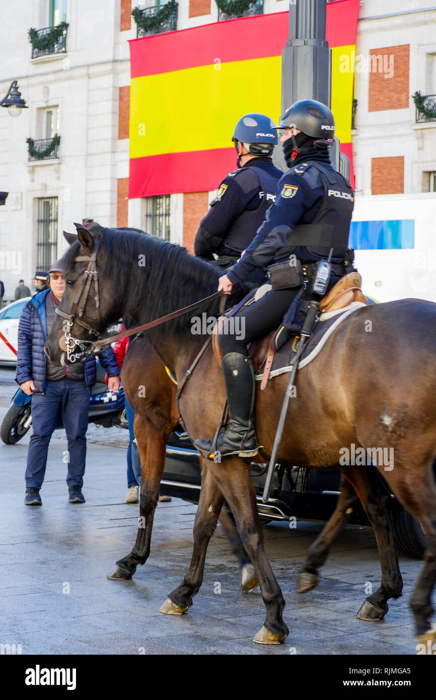 Mounted Police officers, Puerta del Sol, Madrid, Spain Stock Photo - Alamy