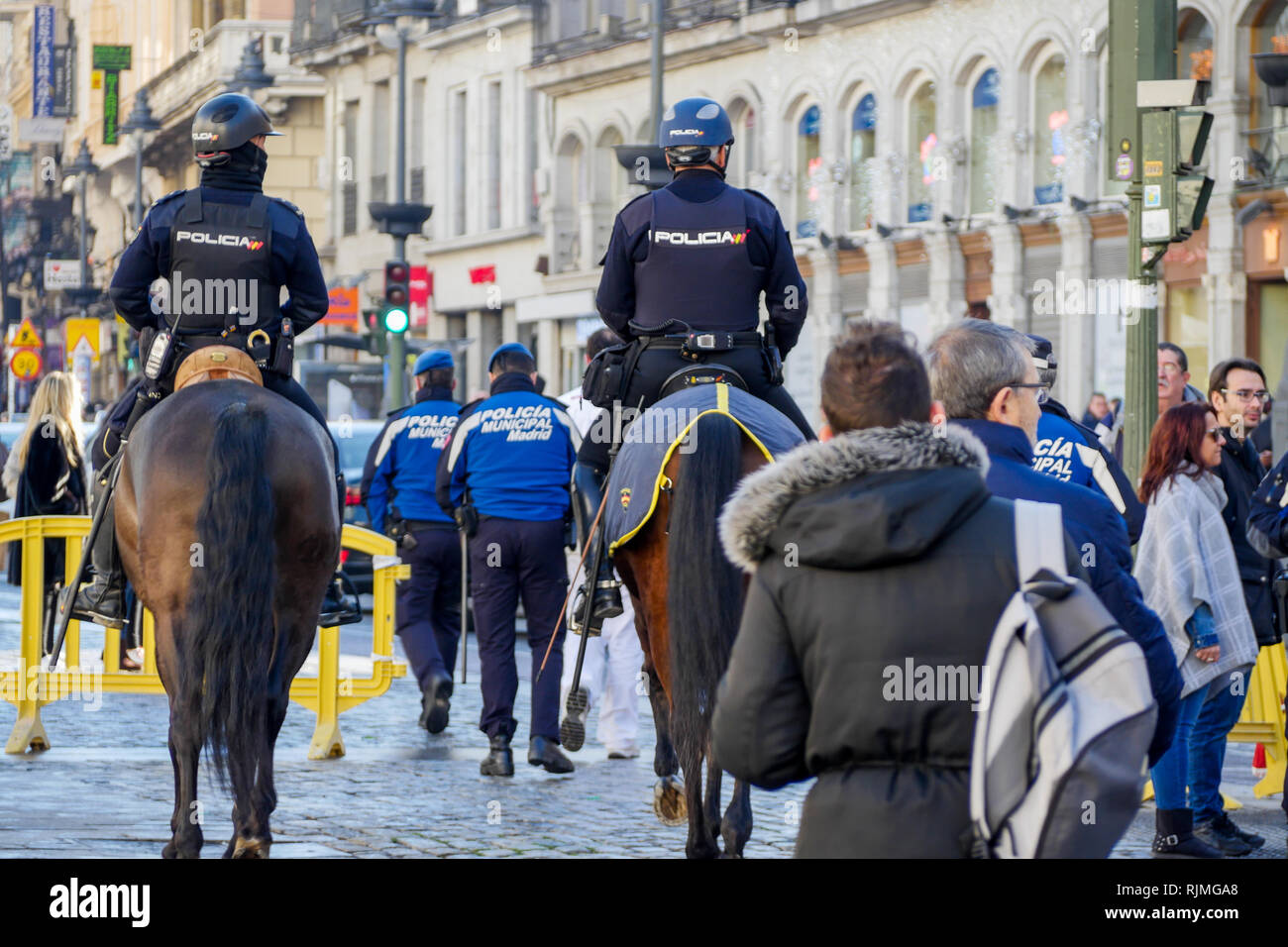 Mounted Police officers, Puerta del Sol, Madrid, Spain Stock Photo - Alamy