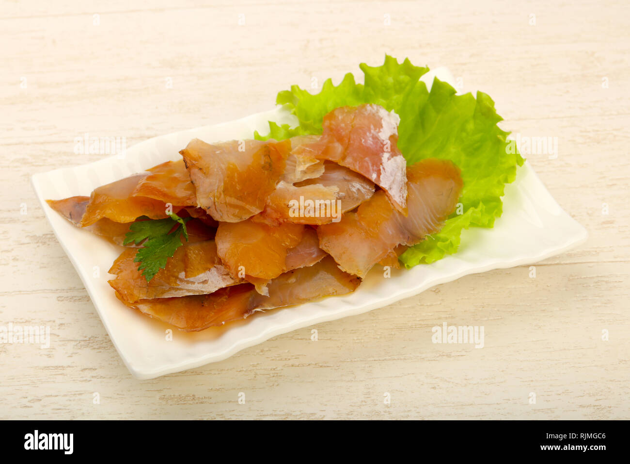 Smoked catfish fillet carpaccio Stock Photo - Alamy