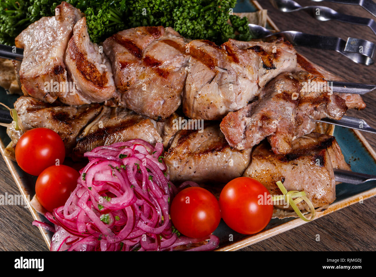 Grilled chicken and pork barbeque Stock Photo - Alamy