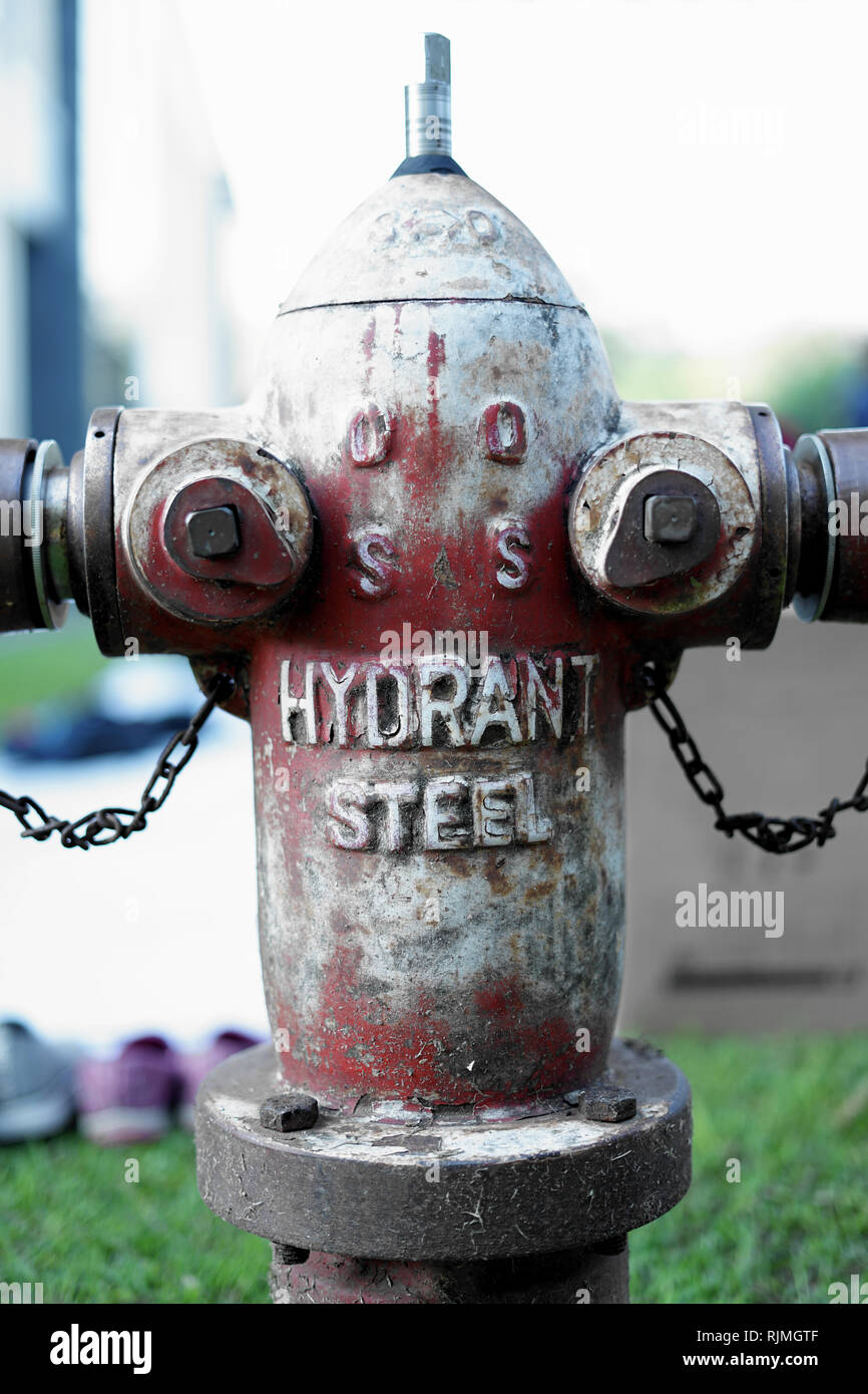 Old Red fire hydran outside building Stock Photo - Alamy
