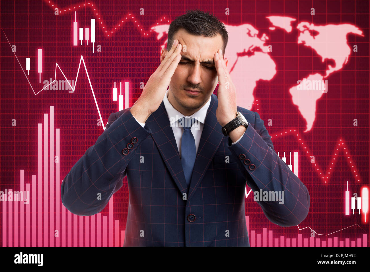 Broker man touching painful temples with both hands as stress gesture ...