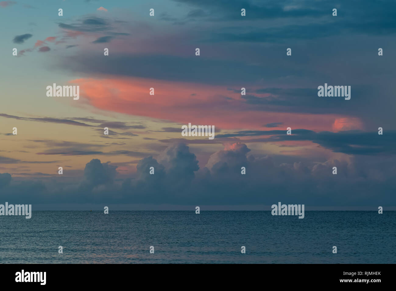 Evening sky with sunset over the sea Stock Photo - Alamy