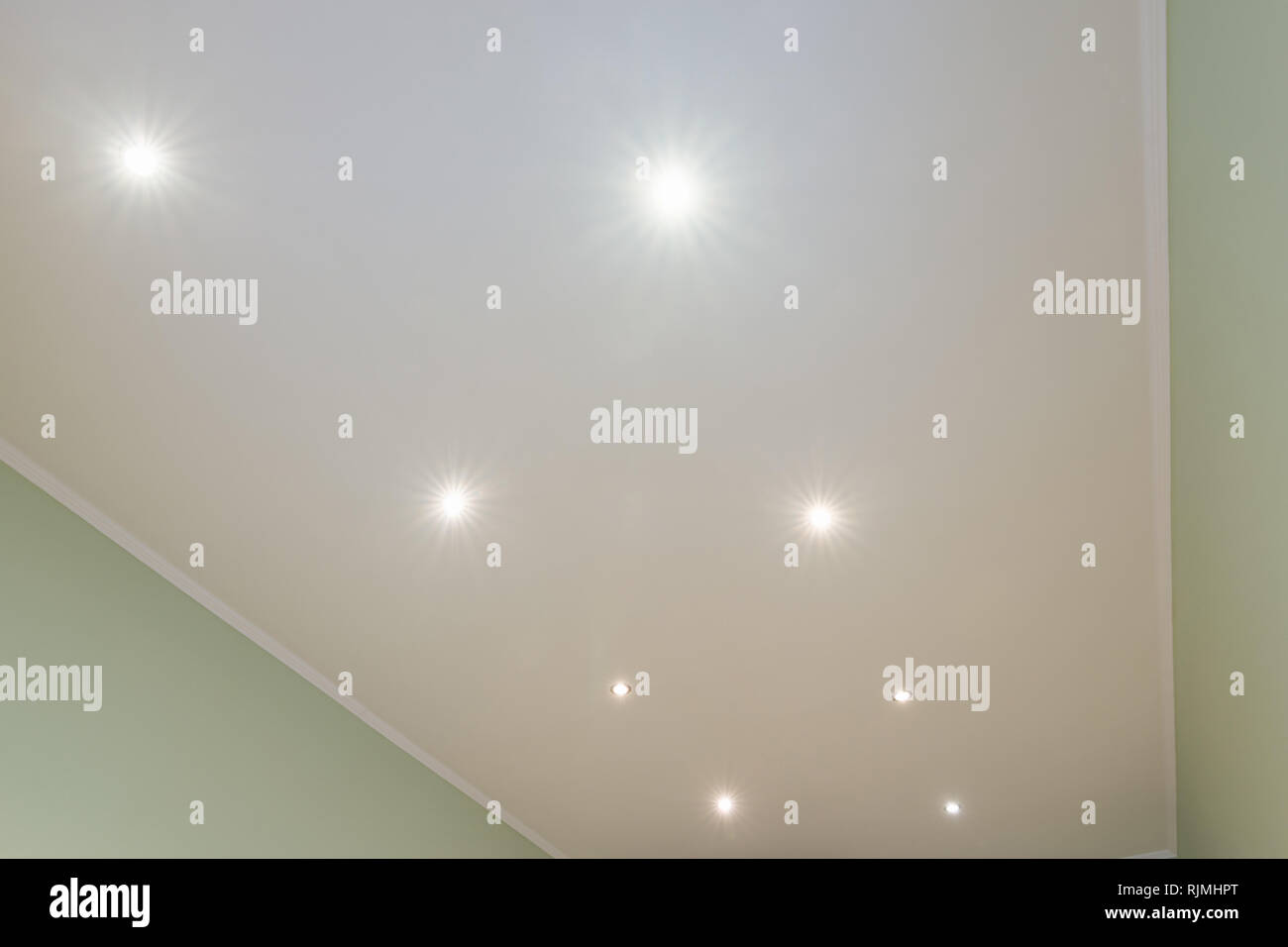 Ceiling in the room with spotlights installed and turned on Stock Photo ...