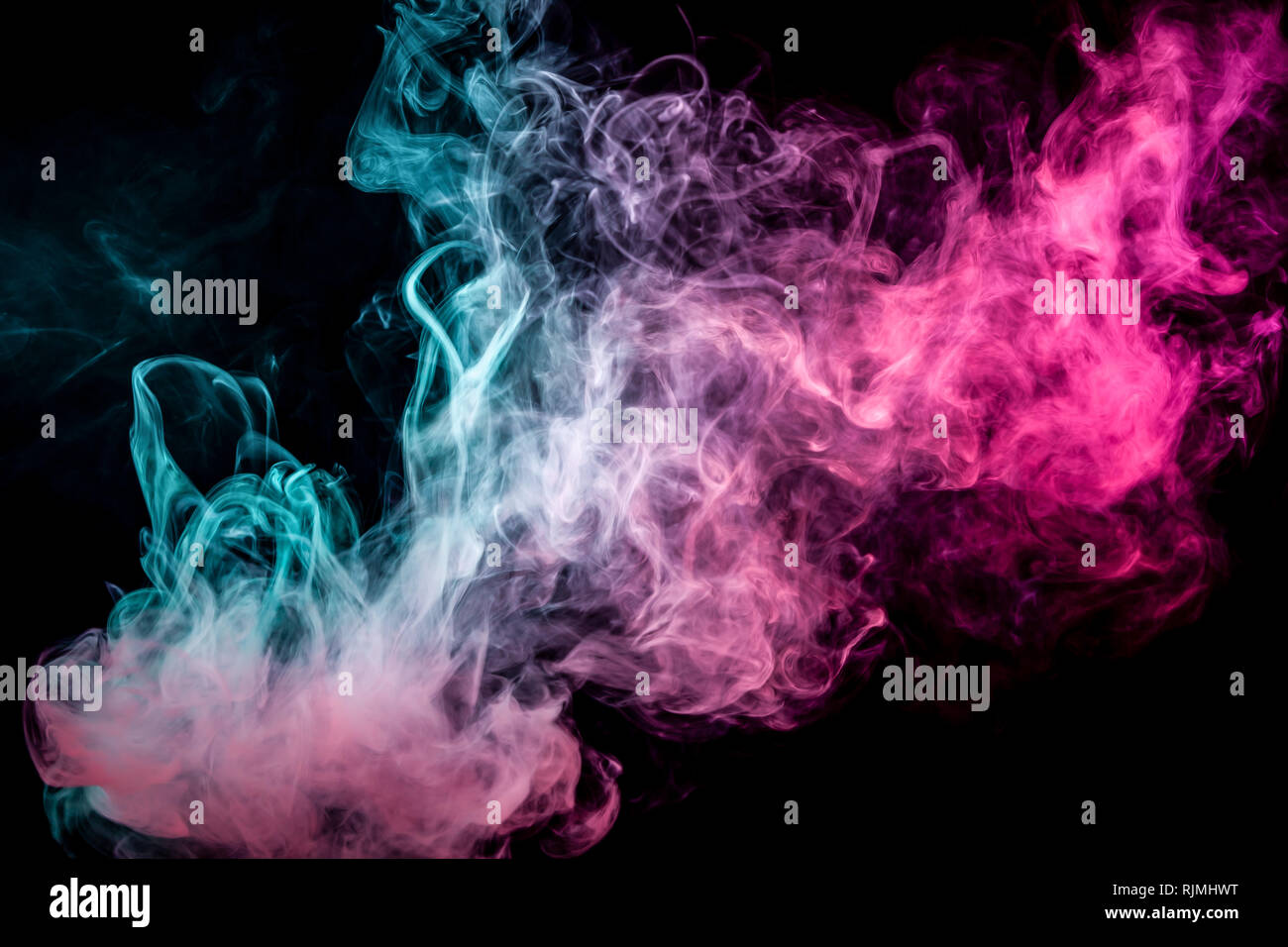 Cloud of pink and blue smoke on a black isolated background. Background ...