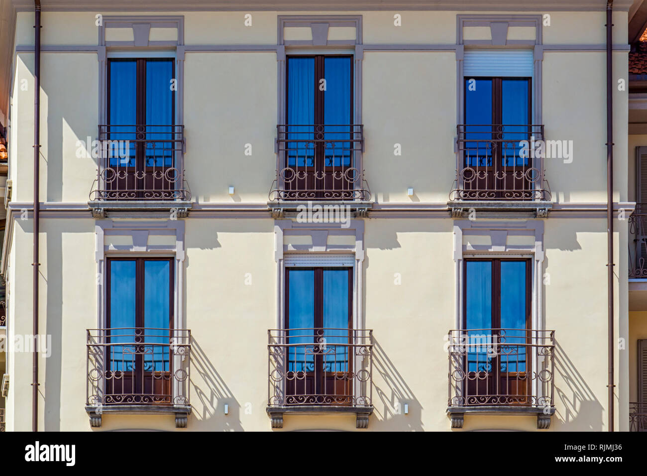 Building facade with balcony Stock Photo - Alamy