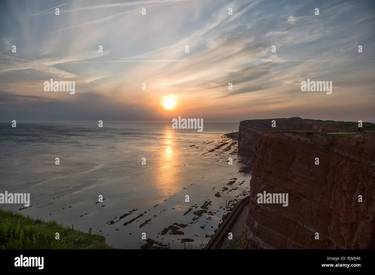 Sunset at the red cliffs of Helgoland Stock Photo - Alamy