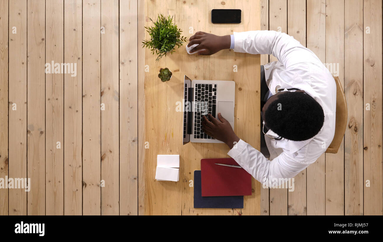 Healthcare professional working laptop hi-res stock photography and ...