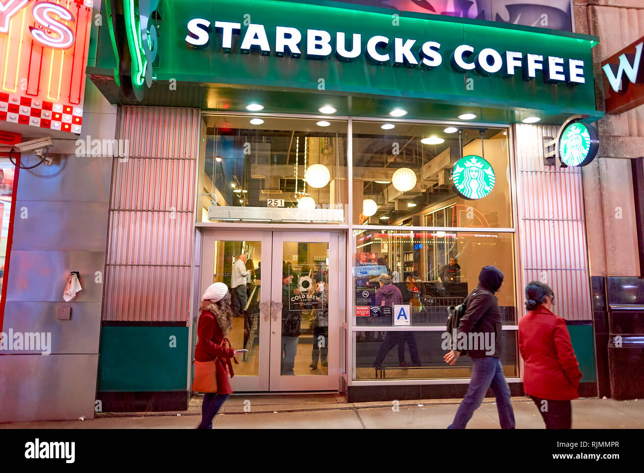 NEW YORK - CIRCA MARCH 2016: Starbucks Cafe at night. Starbucks ...