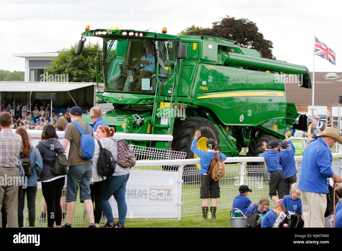 Huge John Deere combine harvester being shown in the main ring at The ...