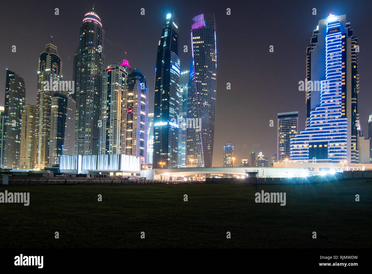 Colorful city lights at night time in Dubai Marina, United Arab ...