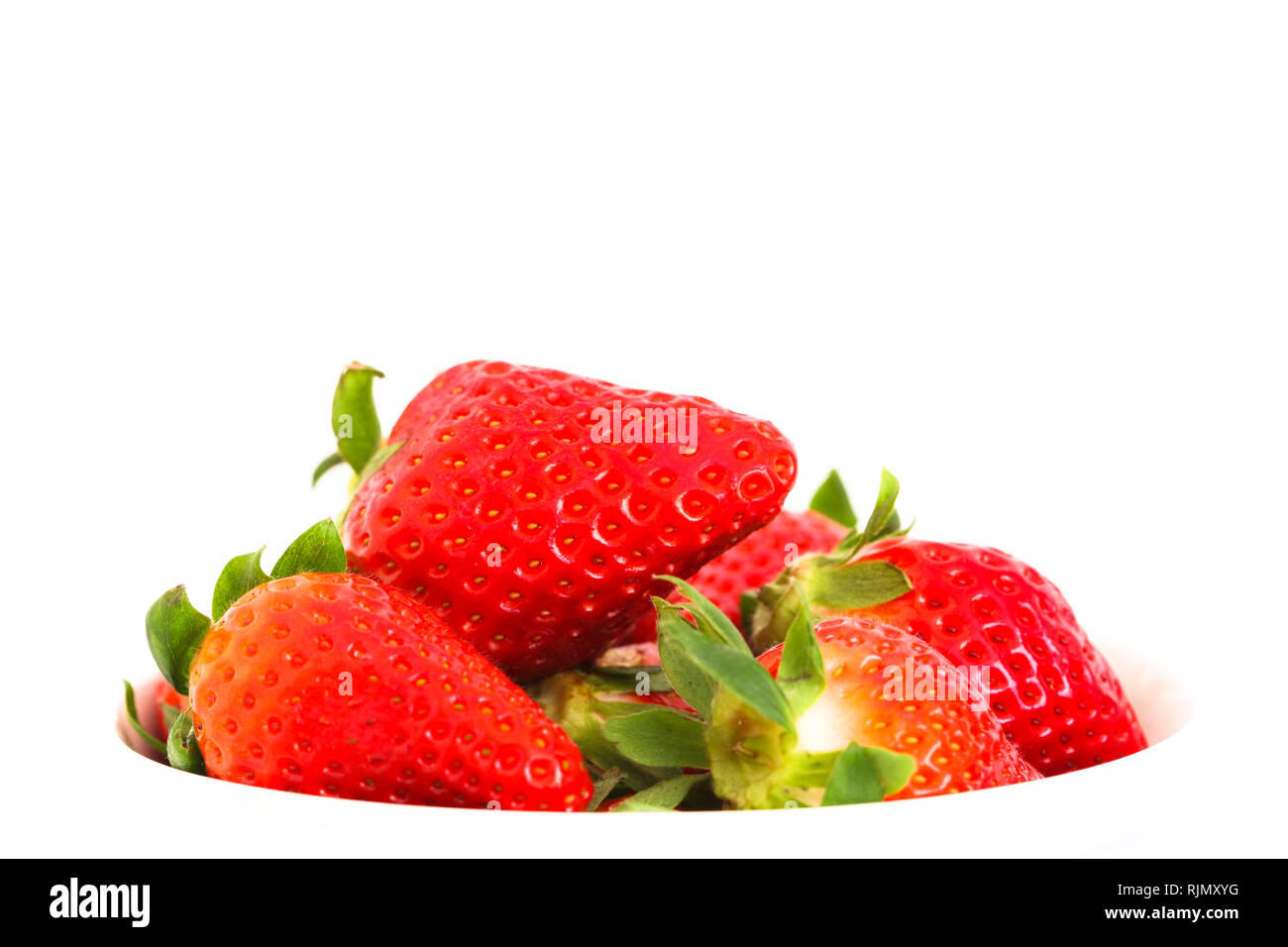 Fresh and natural red strawberries with green leaves isolated and ...