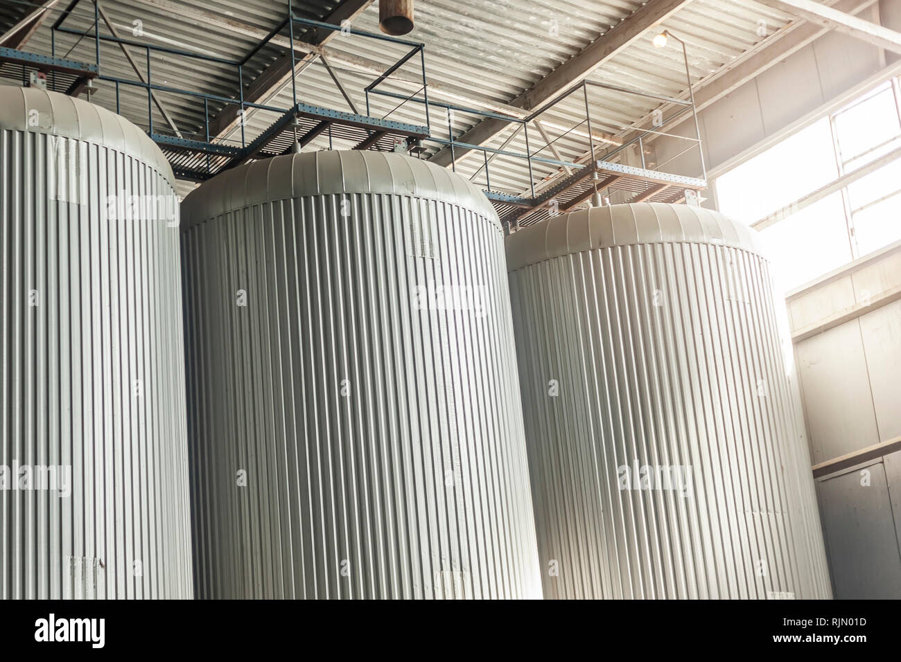 brewery tanks containers beer production . Toned Image Stock Photo - Alamy