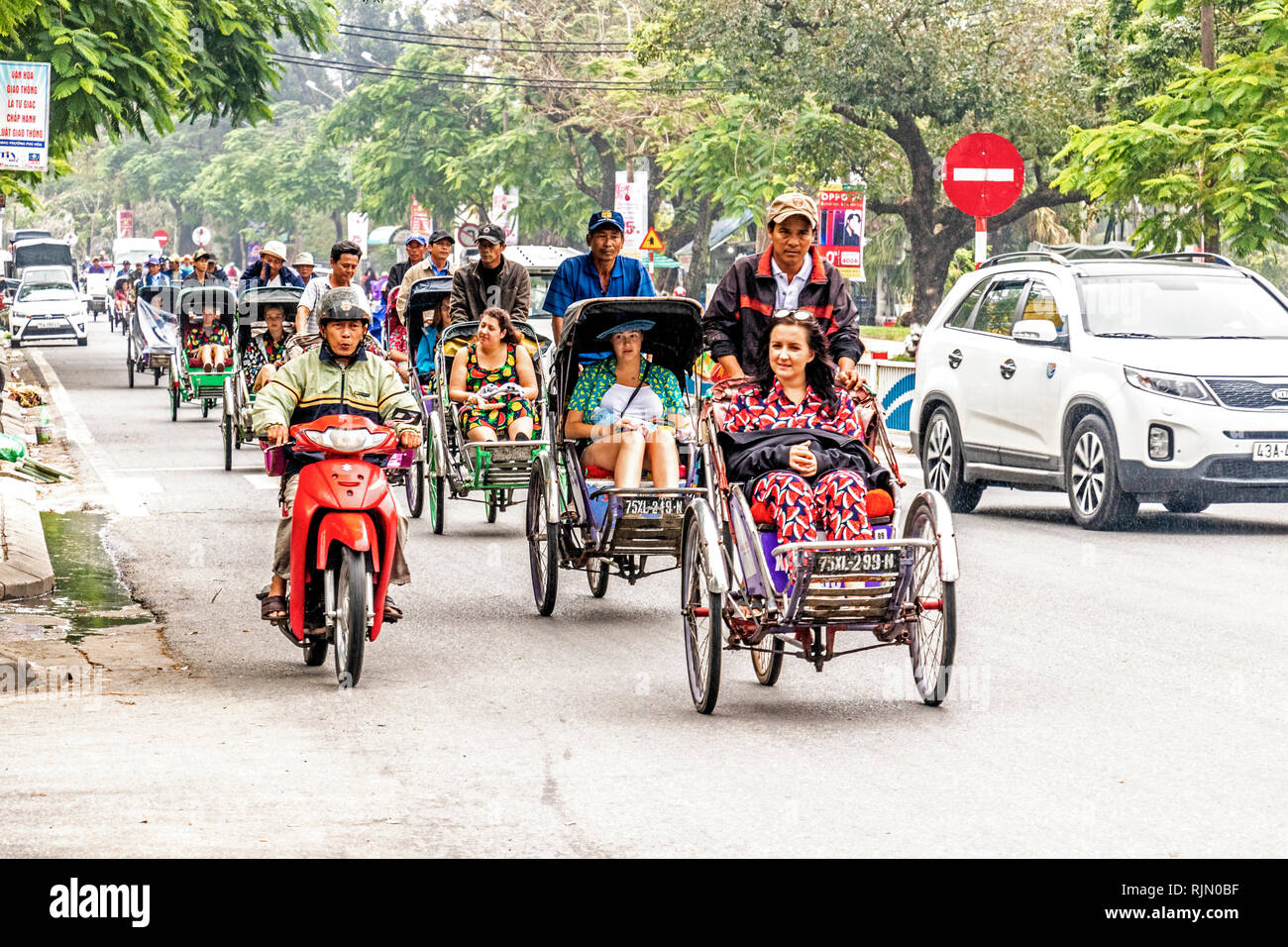 Cycle Rickshaws taking tourist and visitors a tour of Hue in Vietnam ...