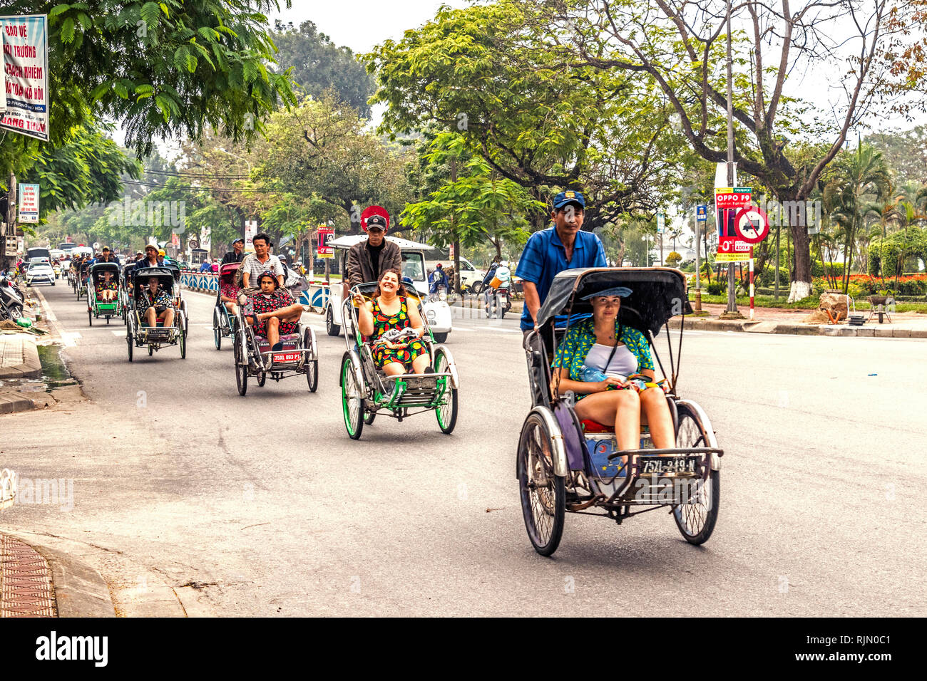 Cycle Rickshaws taking tourist and visitors a tour of Hue in Vietnam ...
